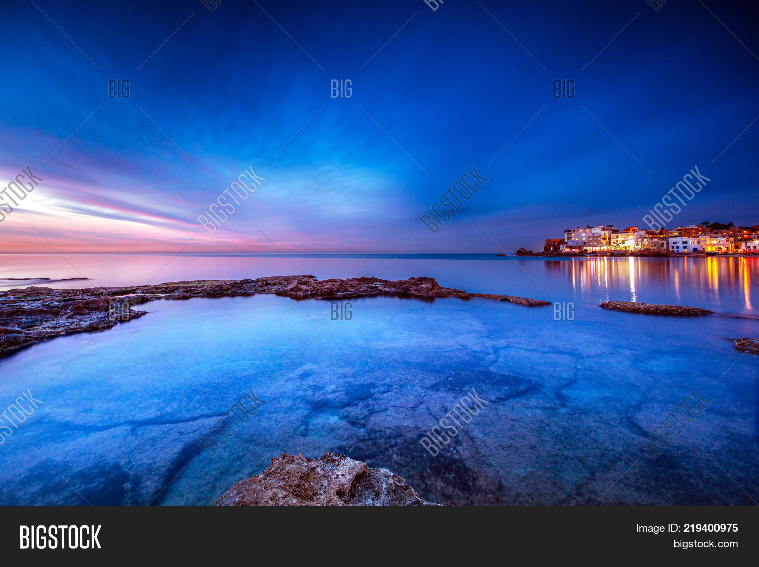 Coastal city on sunset, view on Batroun and mediterranean sea, glowing ...
