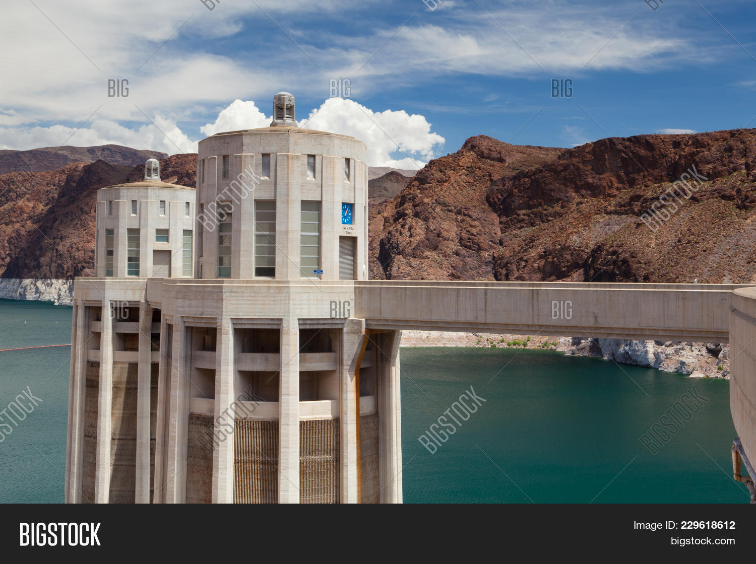 Hoover Dam Towers On The Blue Lake Mead. Hoover Dam Is A Concrete Arch ...