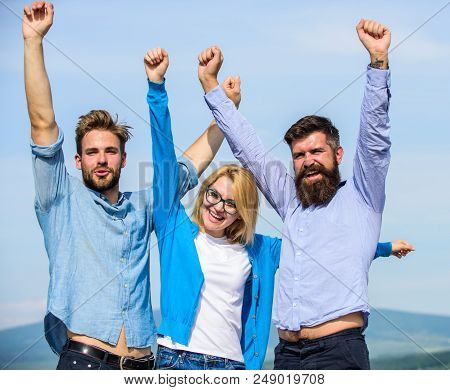 Company Reached Top. Company Of Three Happy Colleagues Or Partners ...