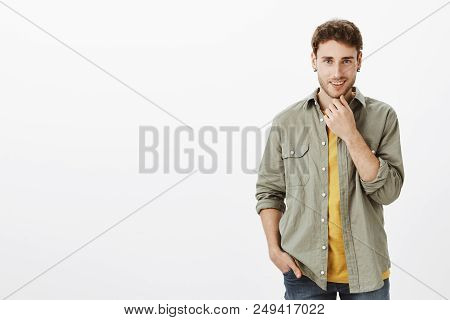 I Am Intrigued. Portrait Of Curious Charming Male Model With Beard And ...