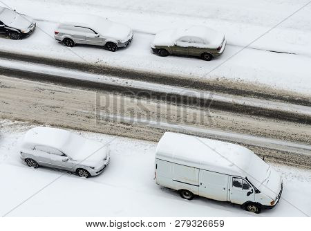 View From Above On Road Rut And Cars Parked On Roadside, Covered With ...