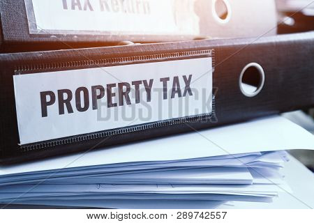 Property Tax And Tax Return Word On Folders Stack With Label Black ...