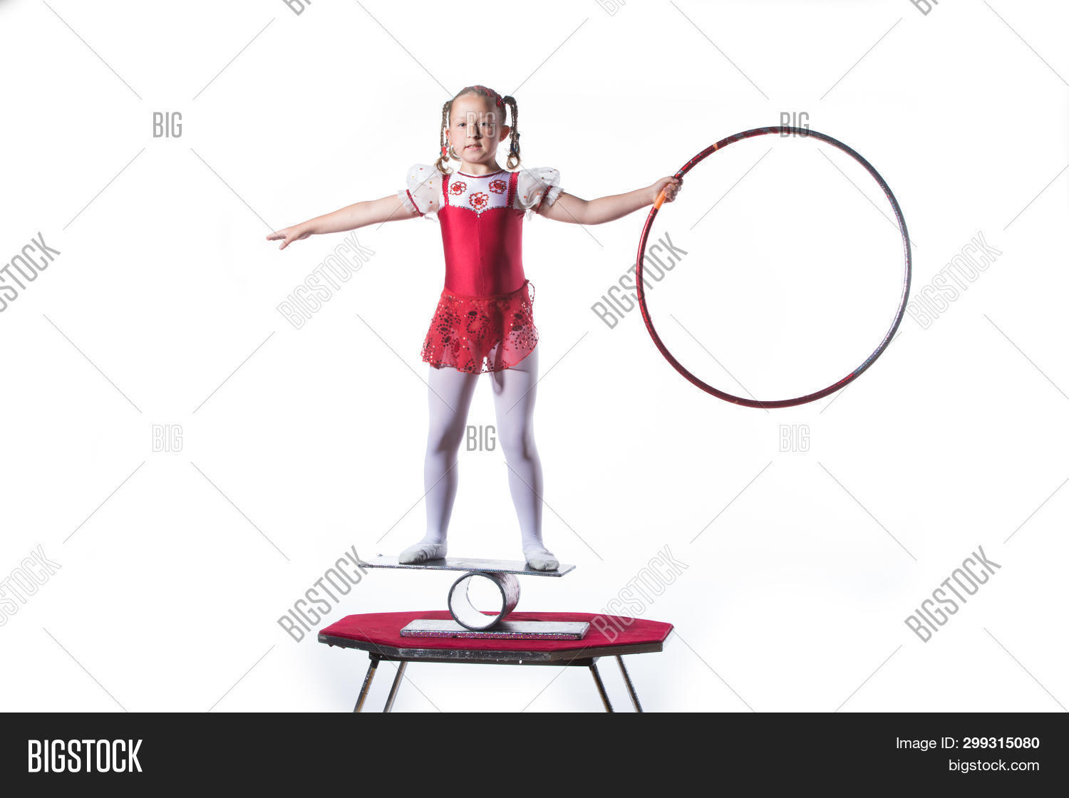 Little Girl Balancing Act On White Background. Young Gymnast Balancing ...